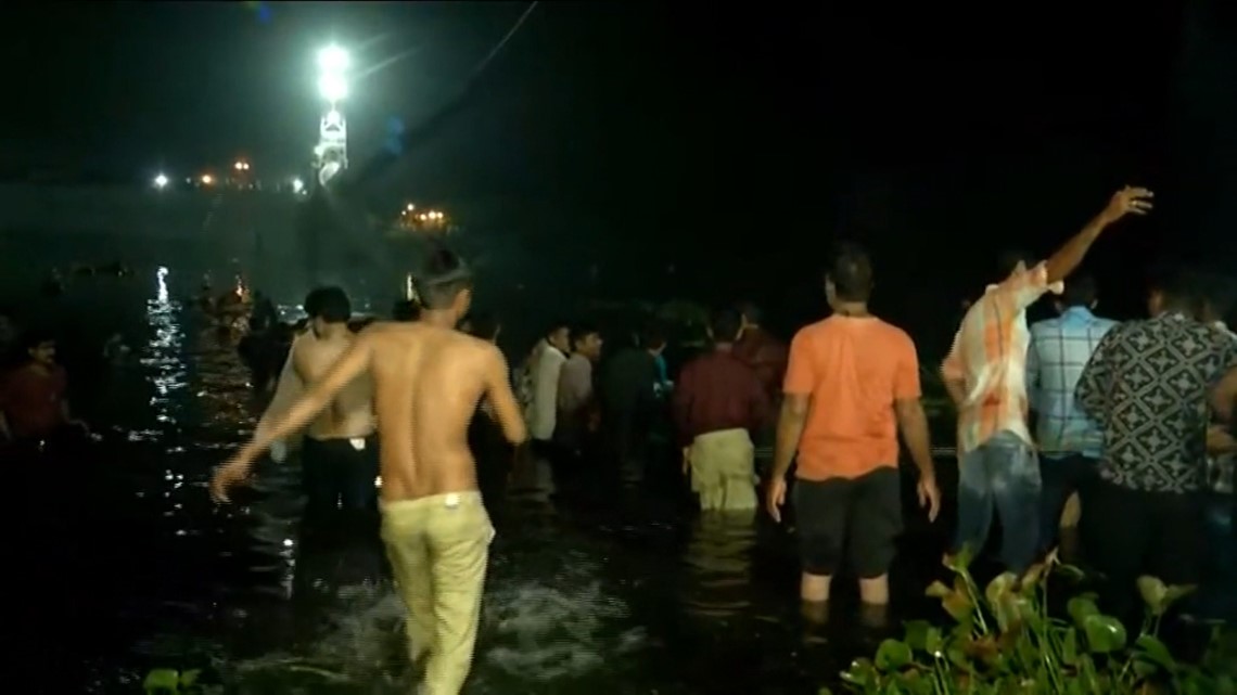 India bridge collapse: At least 50 dead, many injured after cable bridge collapse | khou.com