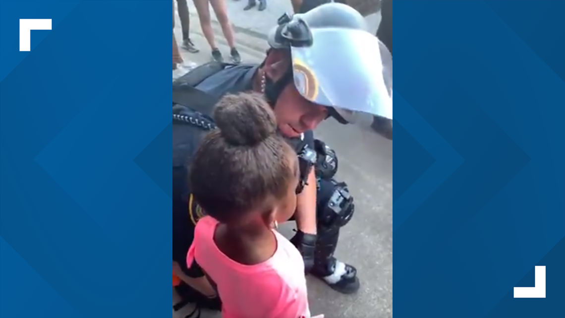 Girl asks HPD officer if she's going to get shot | khou.com