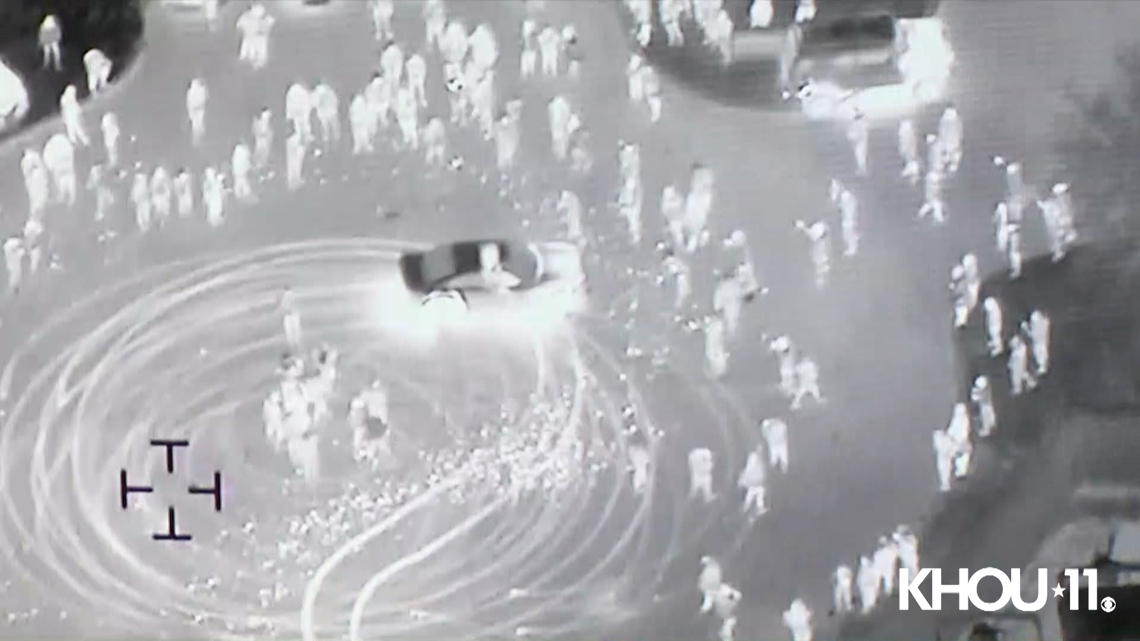 Watch: Houston police share footage of cars doing donuts, hitting ...