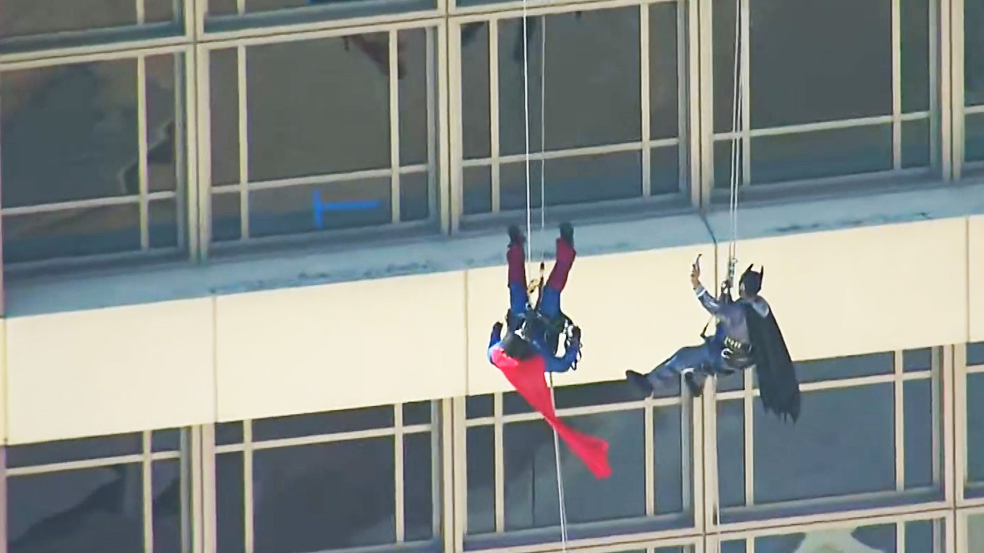 Batman and Superman rappel down hospital to surprise children inside MD ...