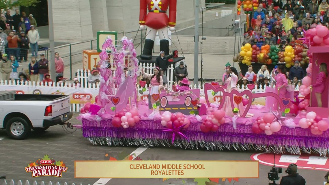 The Pretty in Pink float as it moved through down | khou.com