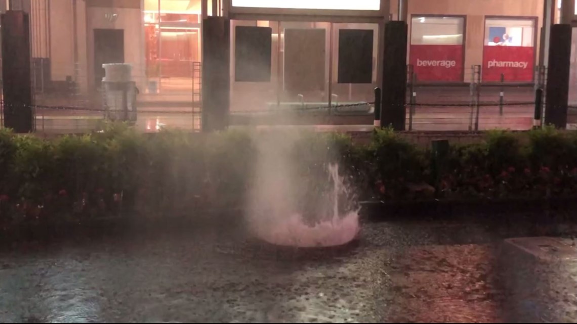 Overflowing manholes flood downtown Houston streets | khou.com