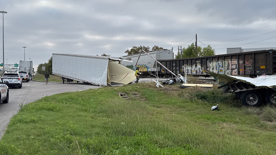 Crazy video of train slamming into semi that got stuck on the tracks ...