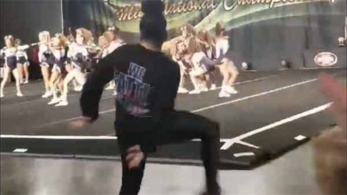The internet is falling in love with these two Webster cheer coaches ...