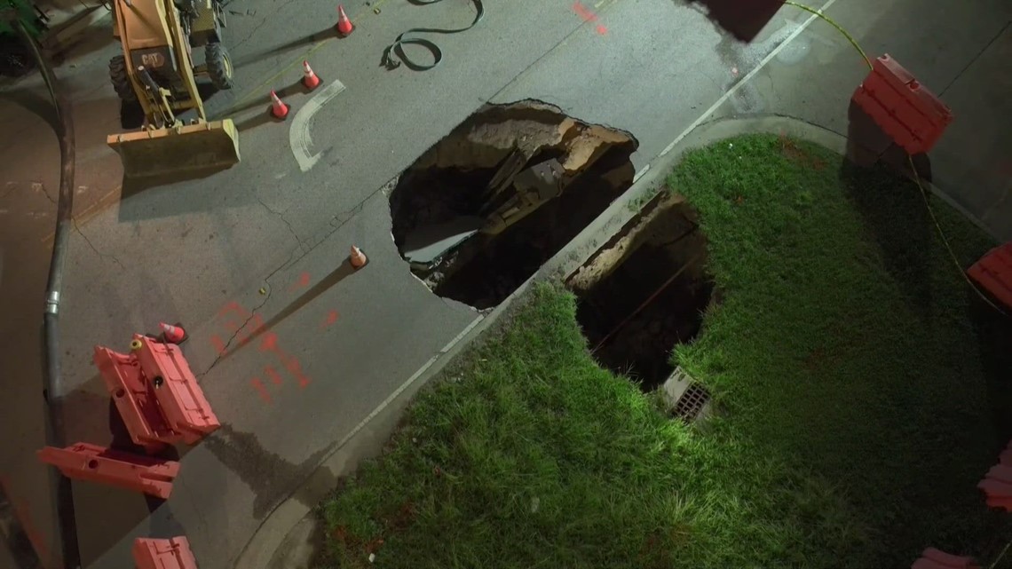 Street collapses in Houston causing massive sinkhole | khou.com