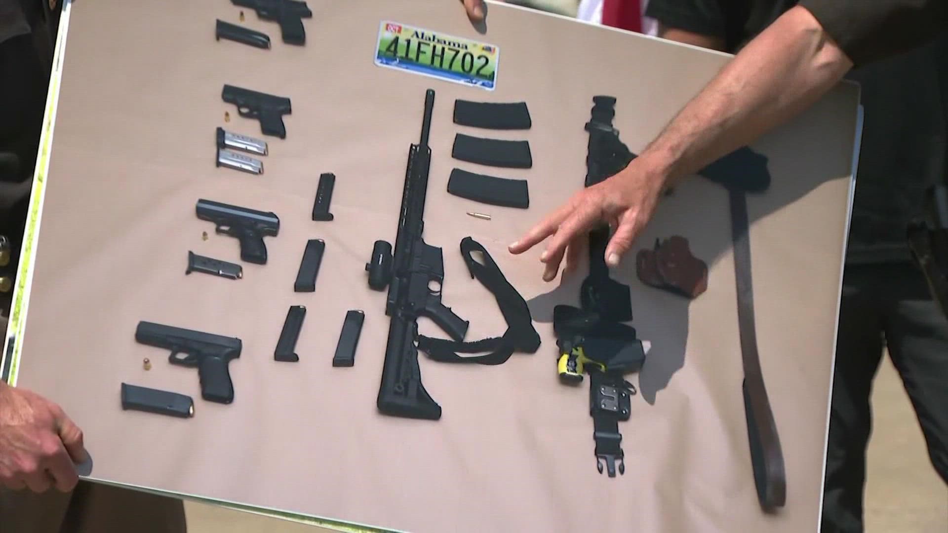 Escaped inmate, prison officer had several weapons, a lot of cash ...