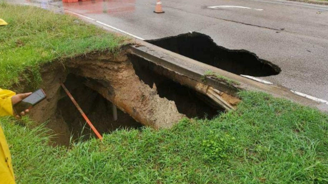 Sinkhole about 4 feet deep leads to street closure in W. Houston | khou.com