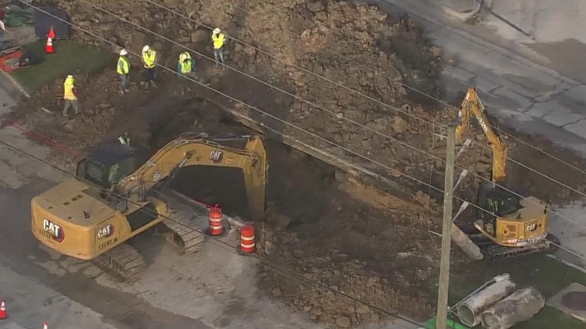 New aerial video shows crews digging out massive Houston-area sinkhole ...