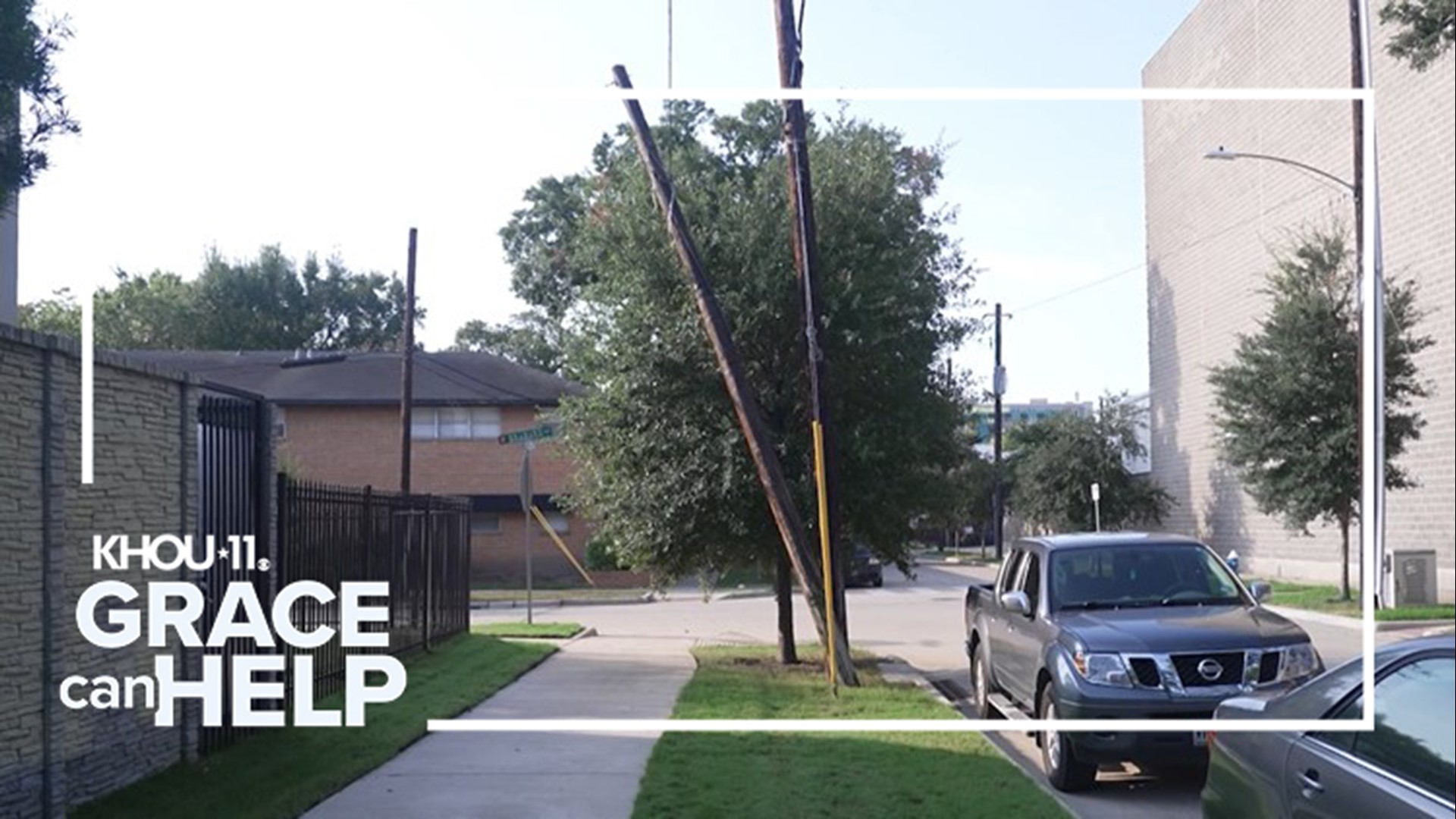 Leaning pole over sidewalk causes concern in Montrose | khou.com
