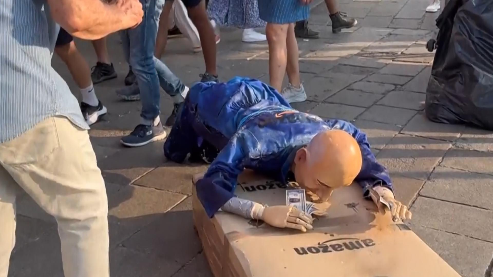 Activists protest Bezos' Venice wedding over income inequality | khou.com