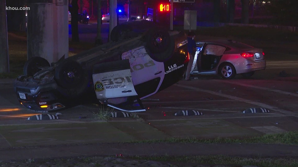 Driver flees after causing crash that flipped Houston police car | khou.com