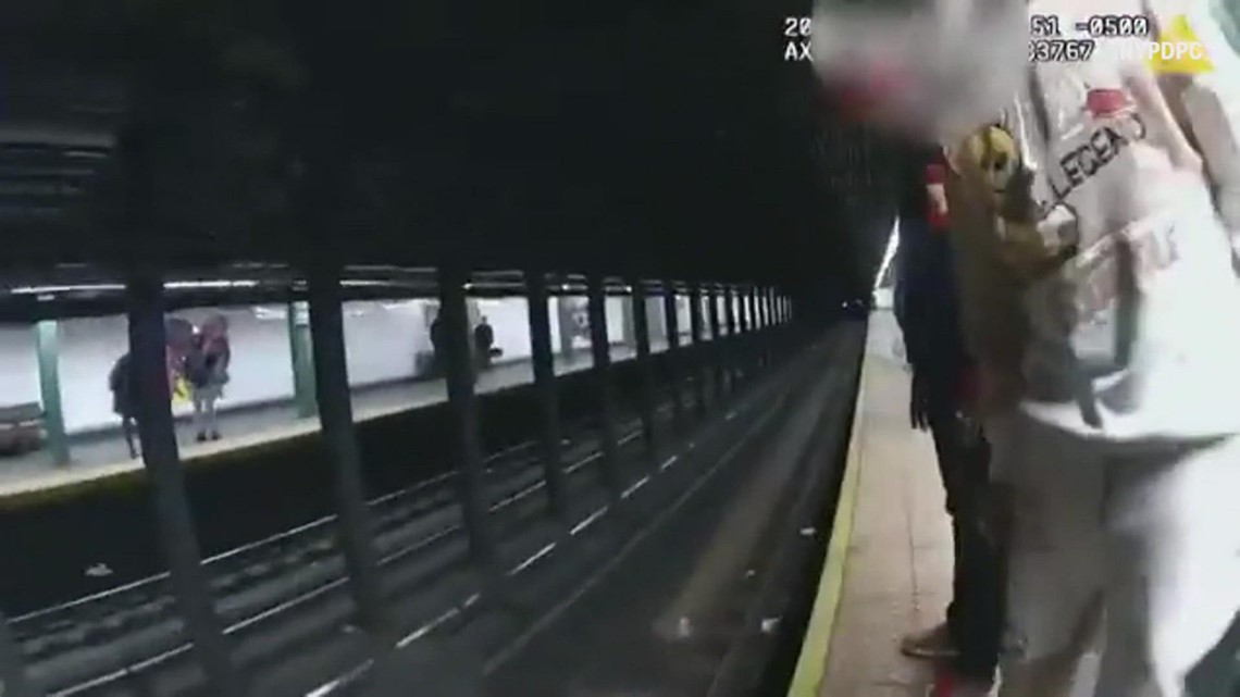 Bodycam footage shows NYPD officers save man who fell on subway tracks | khou.com