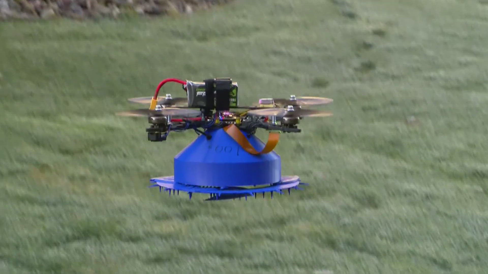 Poop-scooping drone picks up dog poop | khou.com