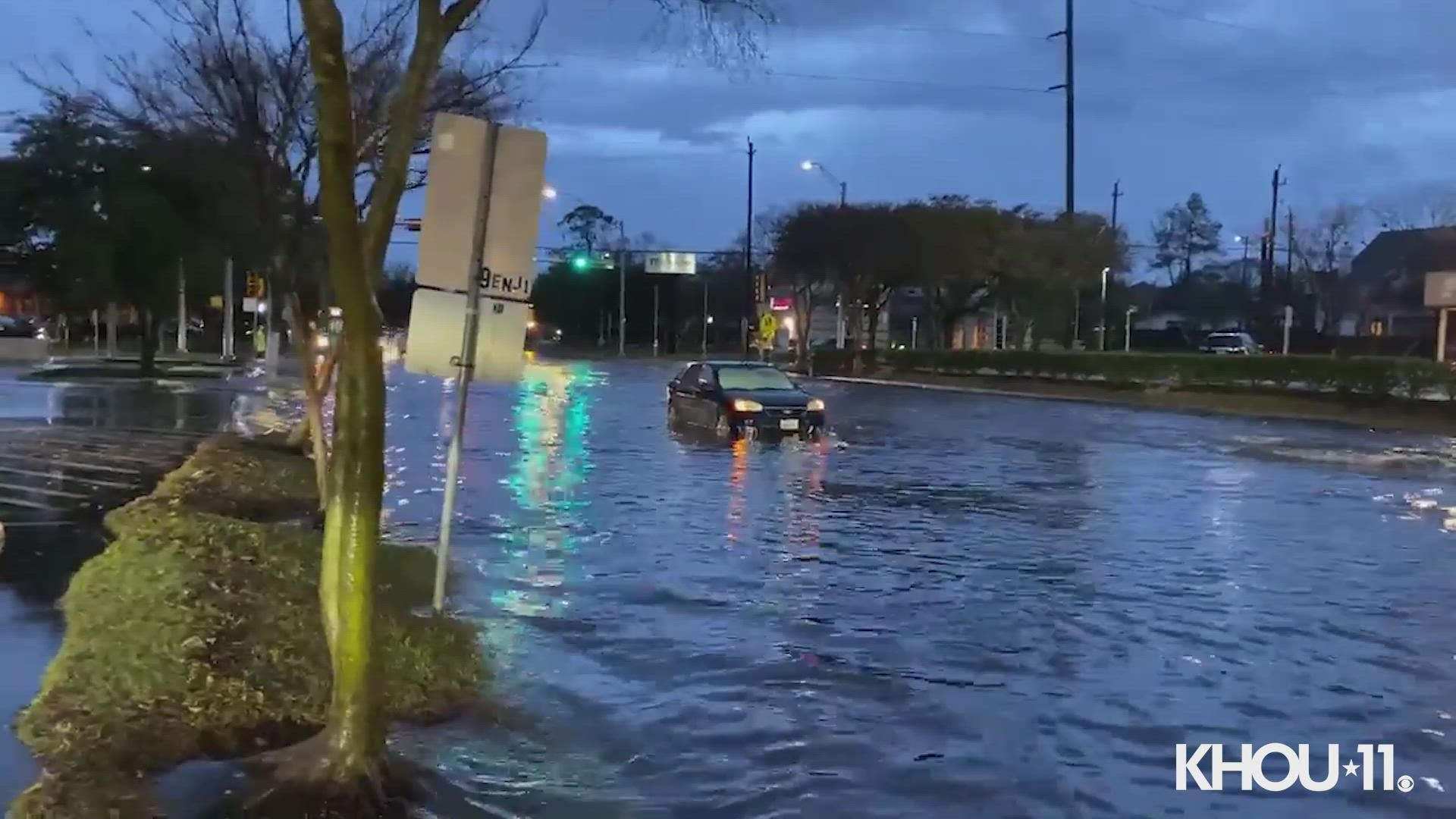 Turn around, don't drown: Street flooding causes car to stall in NW ...