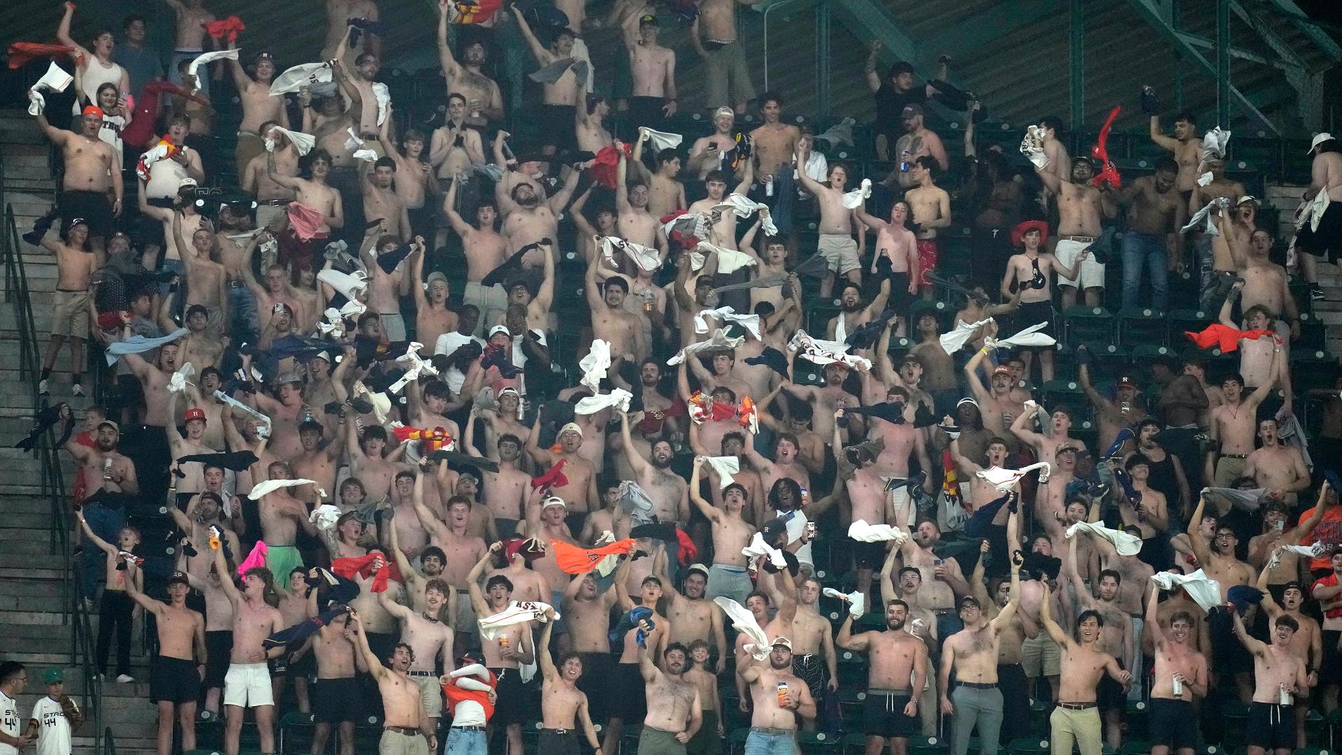 Why are Astros fans taking their shirts off and waving them around in ...