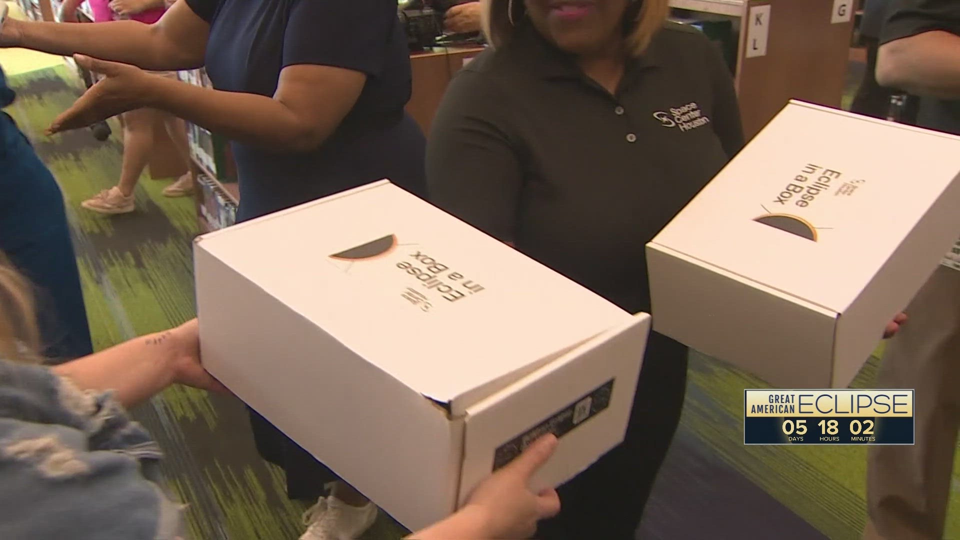 Eclipse boxes prepared by Space Center Houston delivered to kids | khou.com
