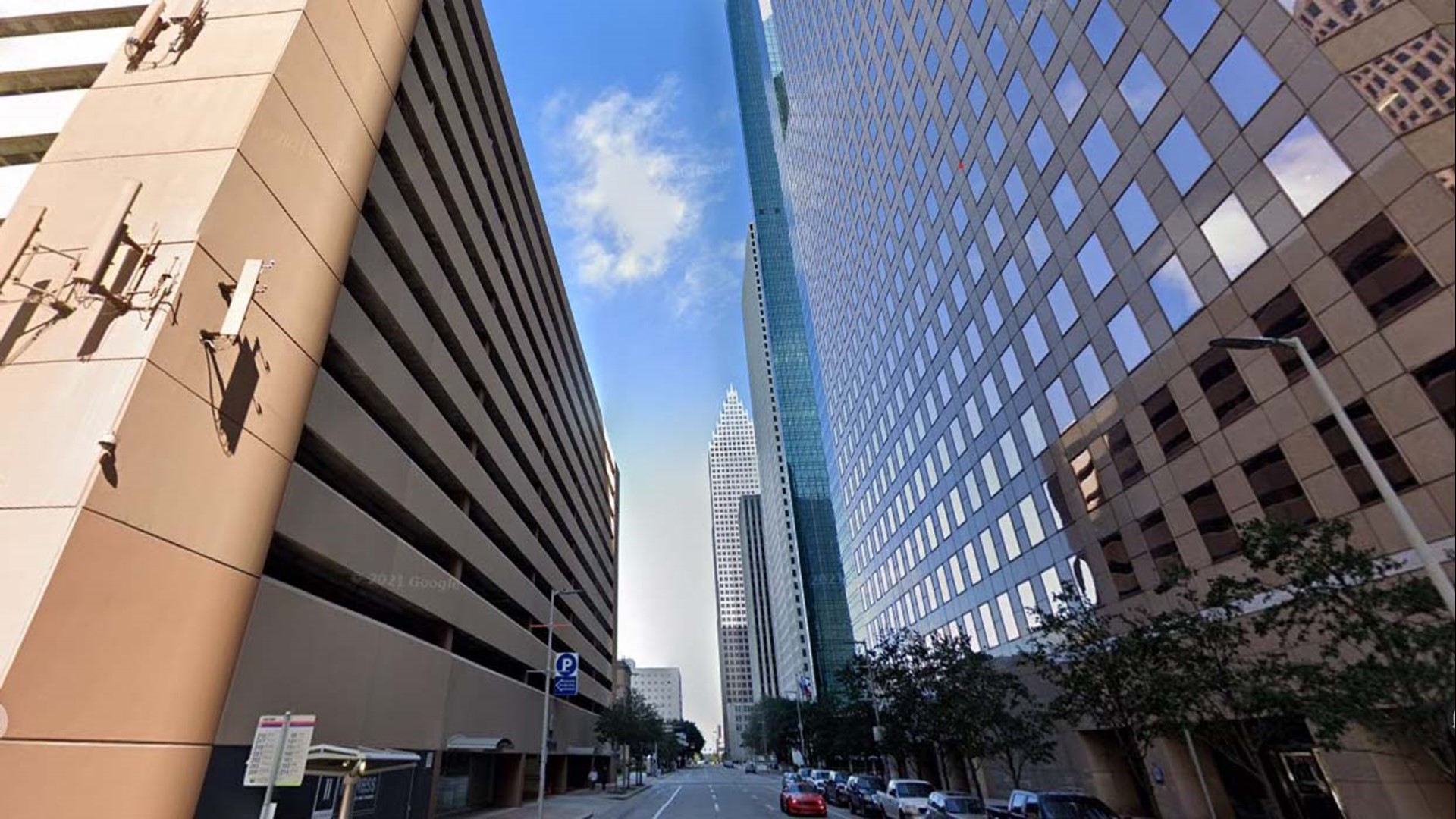 HFD comes to rescue of window washers stuck outside high-rise | khou.com