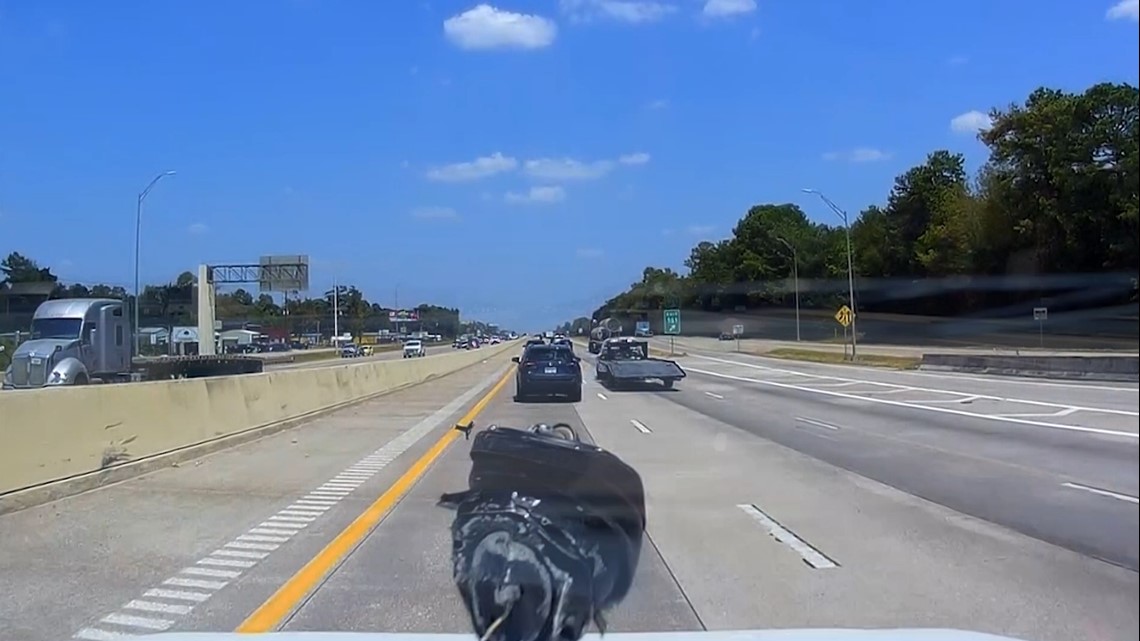 Dashcam video shows moment piece of metal flew through woman's ...