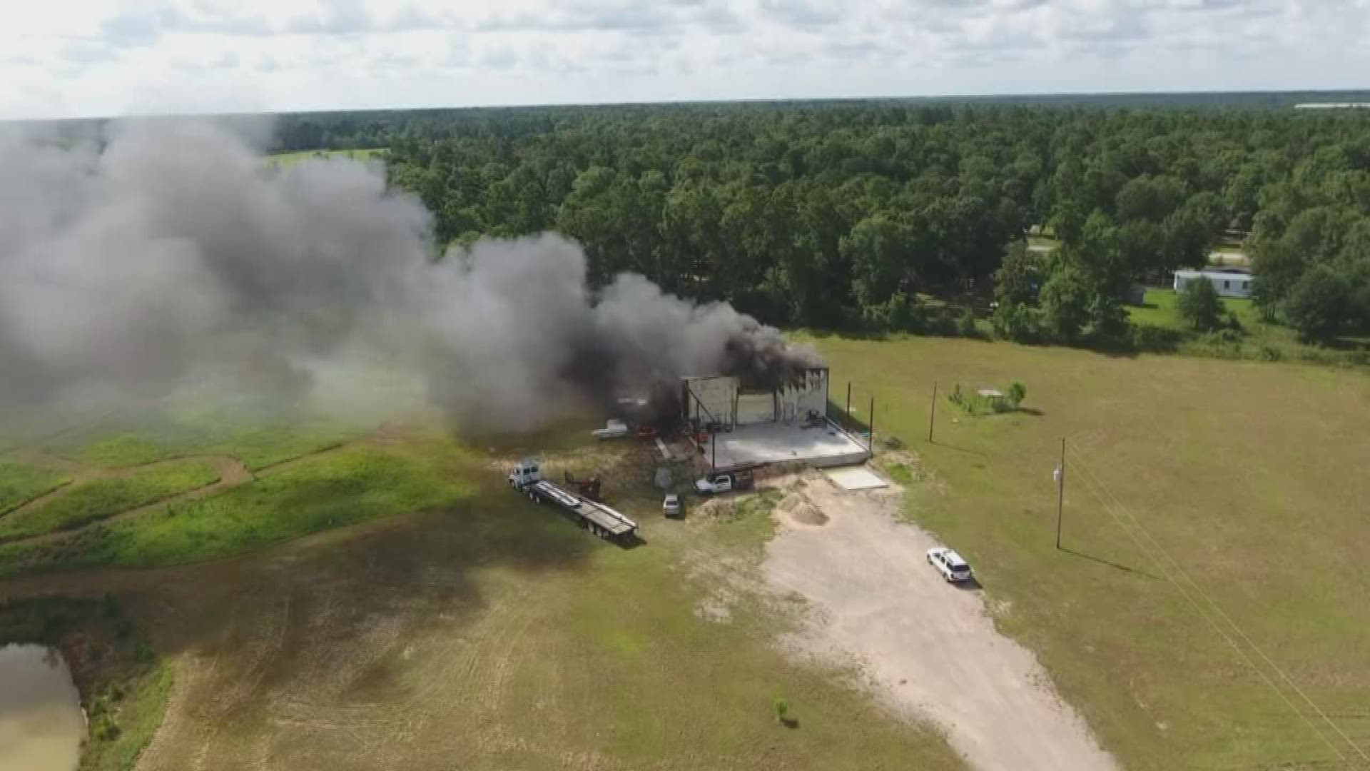 Two firefighters treated for heat exhaustion in Conroe factory fire ...