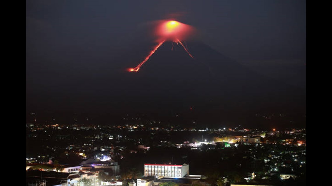Philippine volcano explodes, authorities raise alert level | khou.com