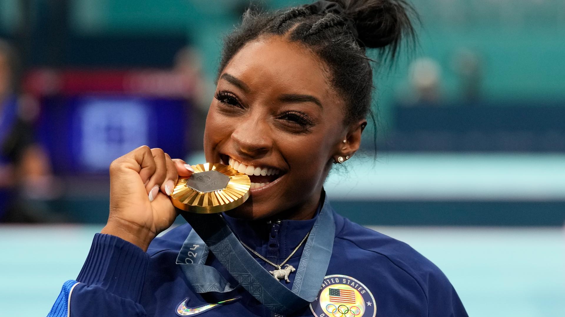 Simone Biles wears goat chain as she won 6th Olympics gold medal | khou.com