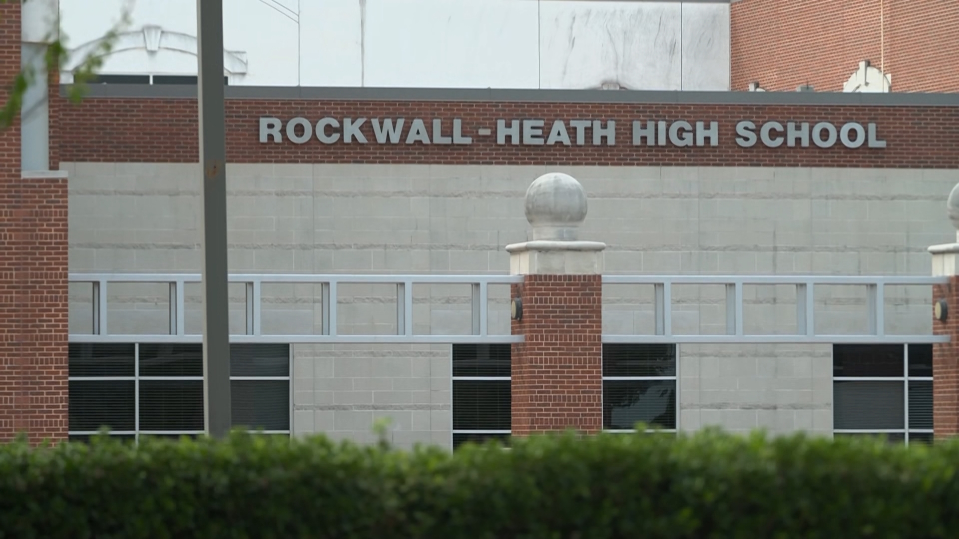 Two antisemitic flags hung from Rockwall ISD high school | khou.com