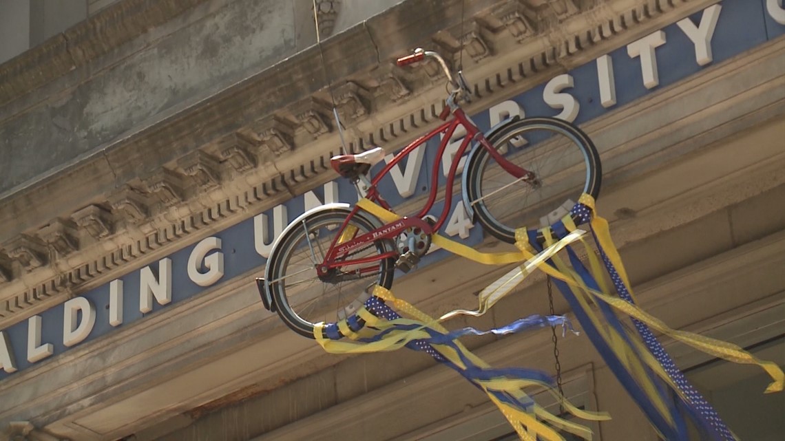 New replica of Ali's red bike on display | khou.com