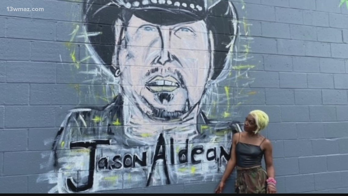 Artist stands by her depiction of country music star Jason Aldean ...