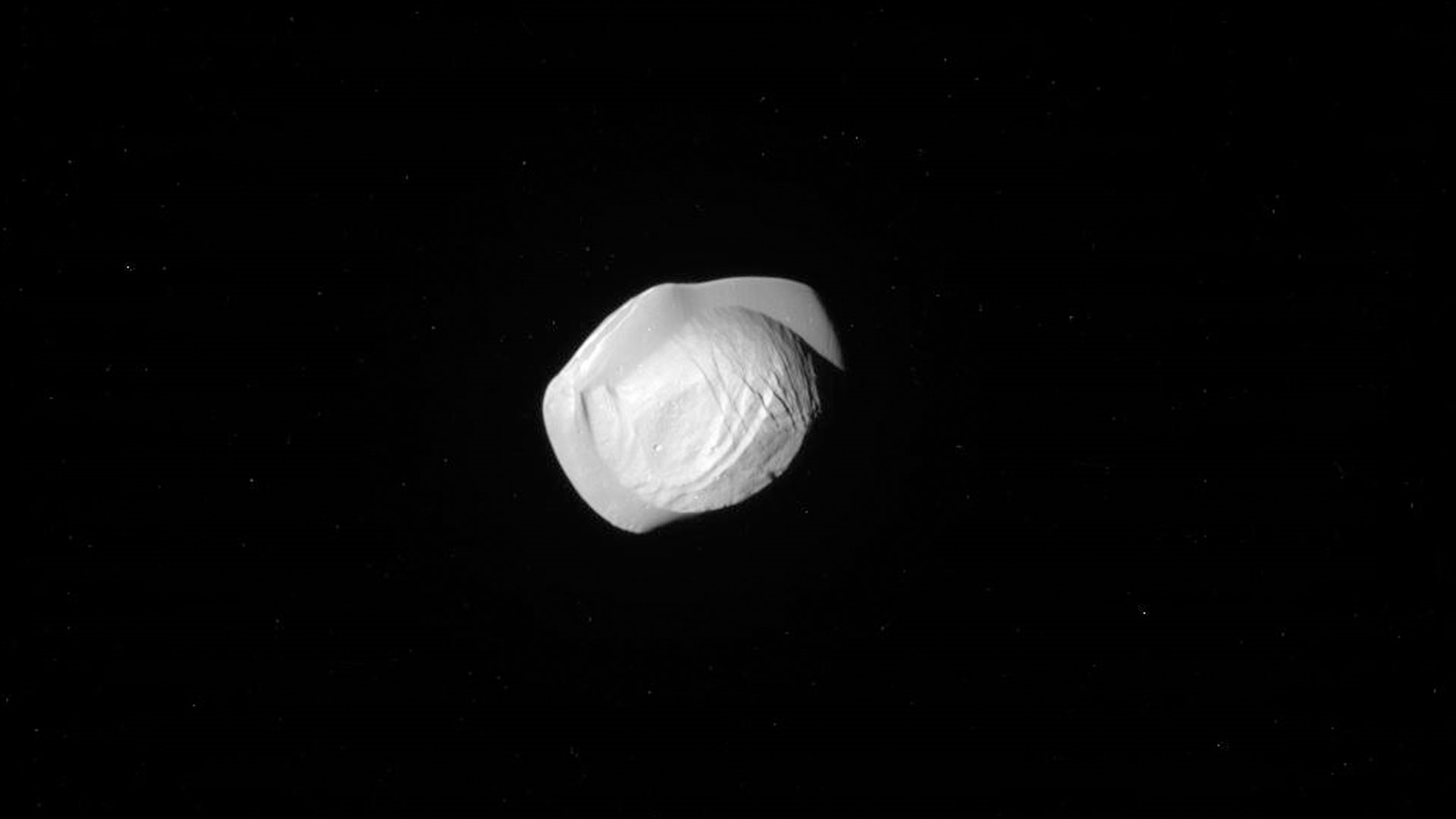 Saturn's tiny moon Pan looks like a space ravioli | khou.com