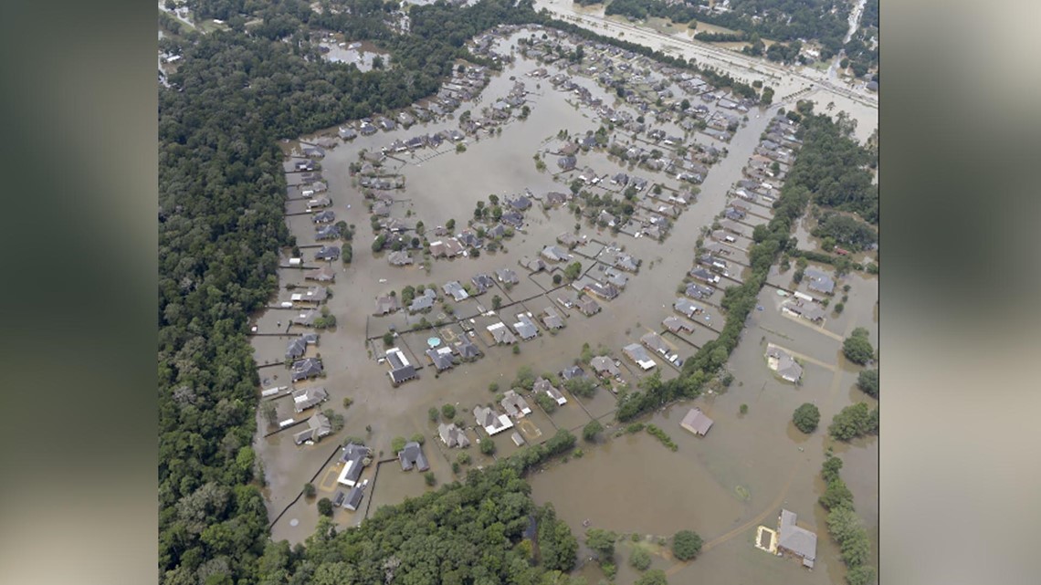 Death toll rises to 13 in historic flood | khou.com