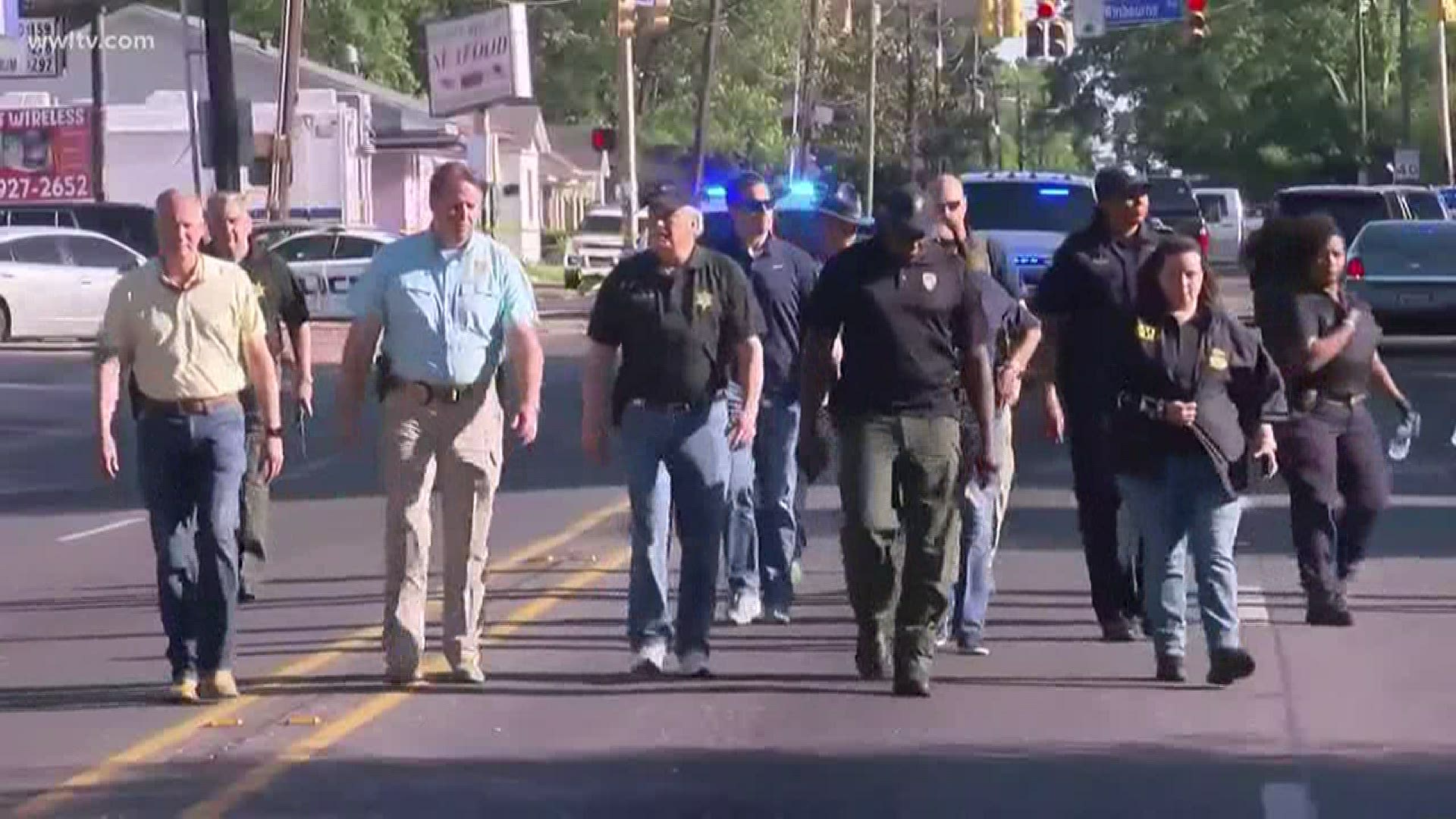 Baton Rouge ambush kills 1 officer; suspect has history of threats ...